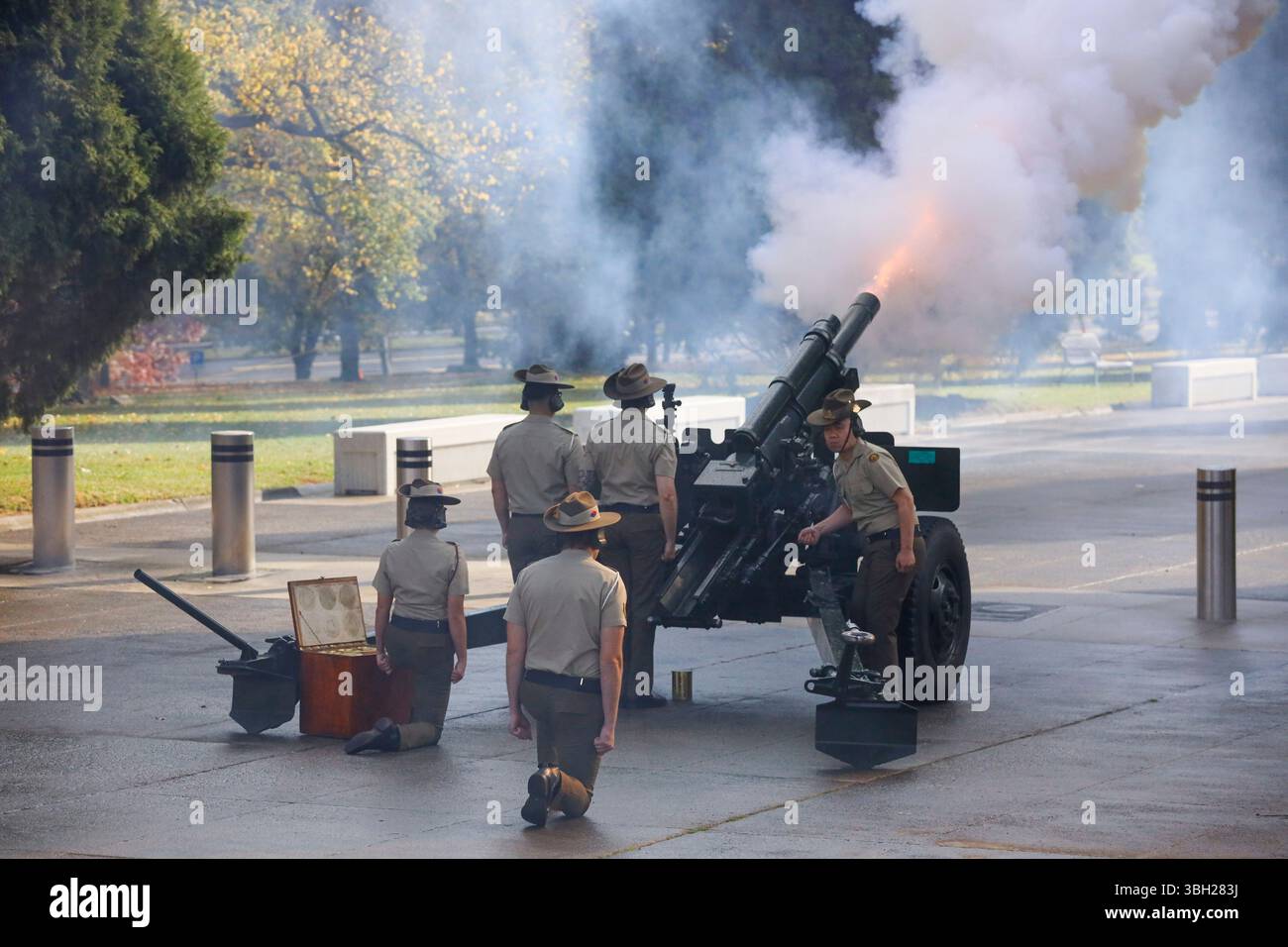 Army Reservists fire one of the 21 ceremonial rounds during the ...