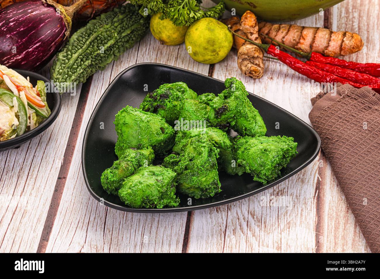 Indian green chicken mint tikka barbecue Stock Photo - Alamy