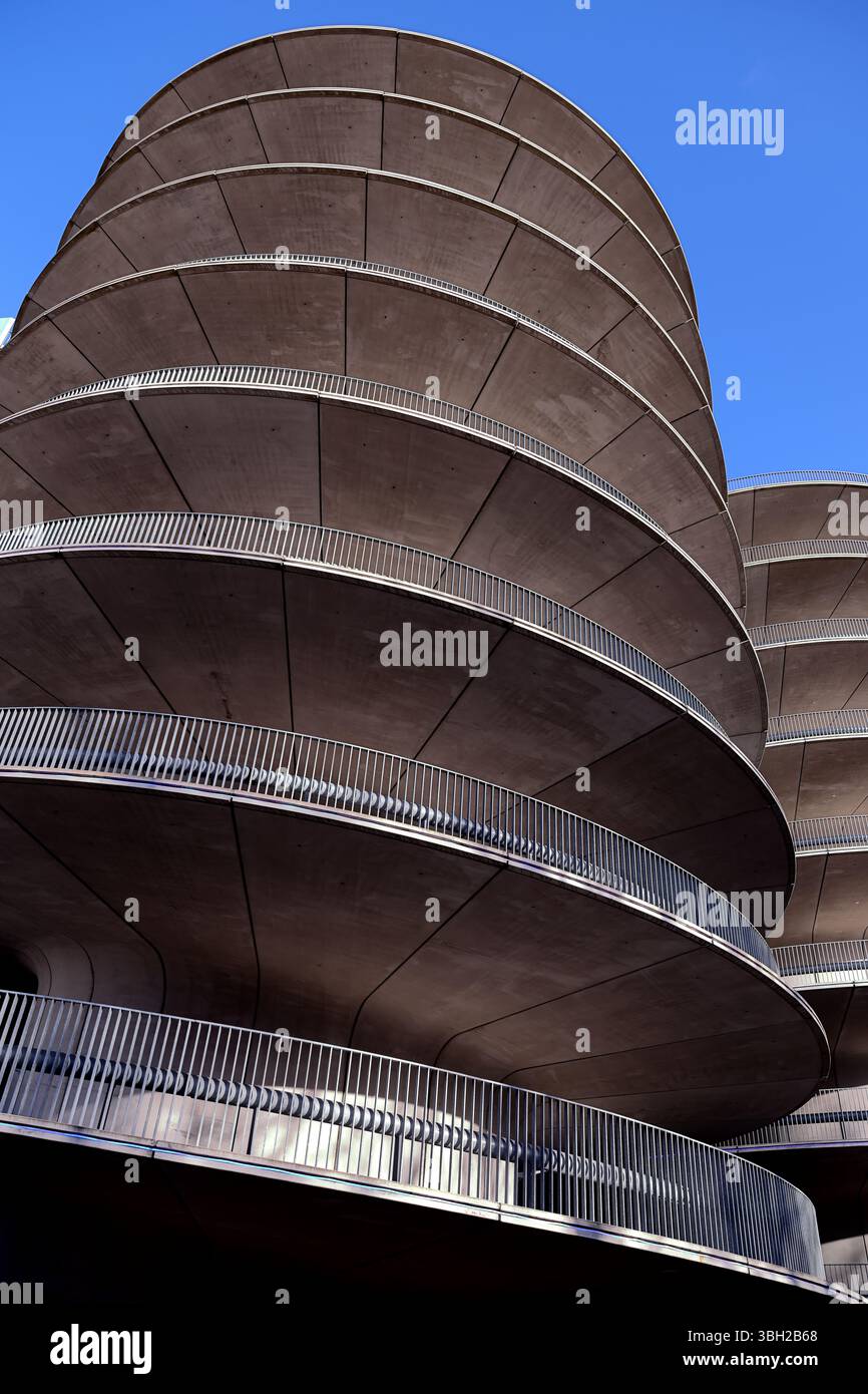 Color photo of Benthem Crouwel’s spiral car park in Amsterdam against a ...