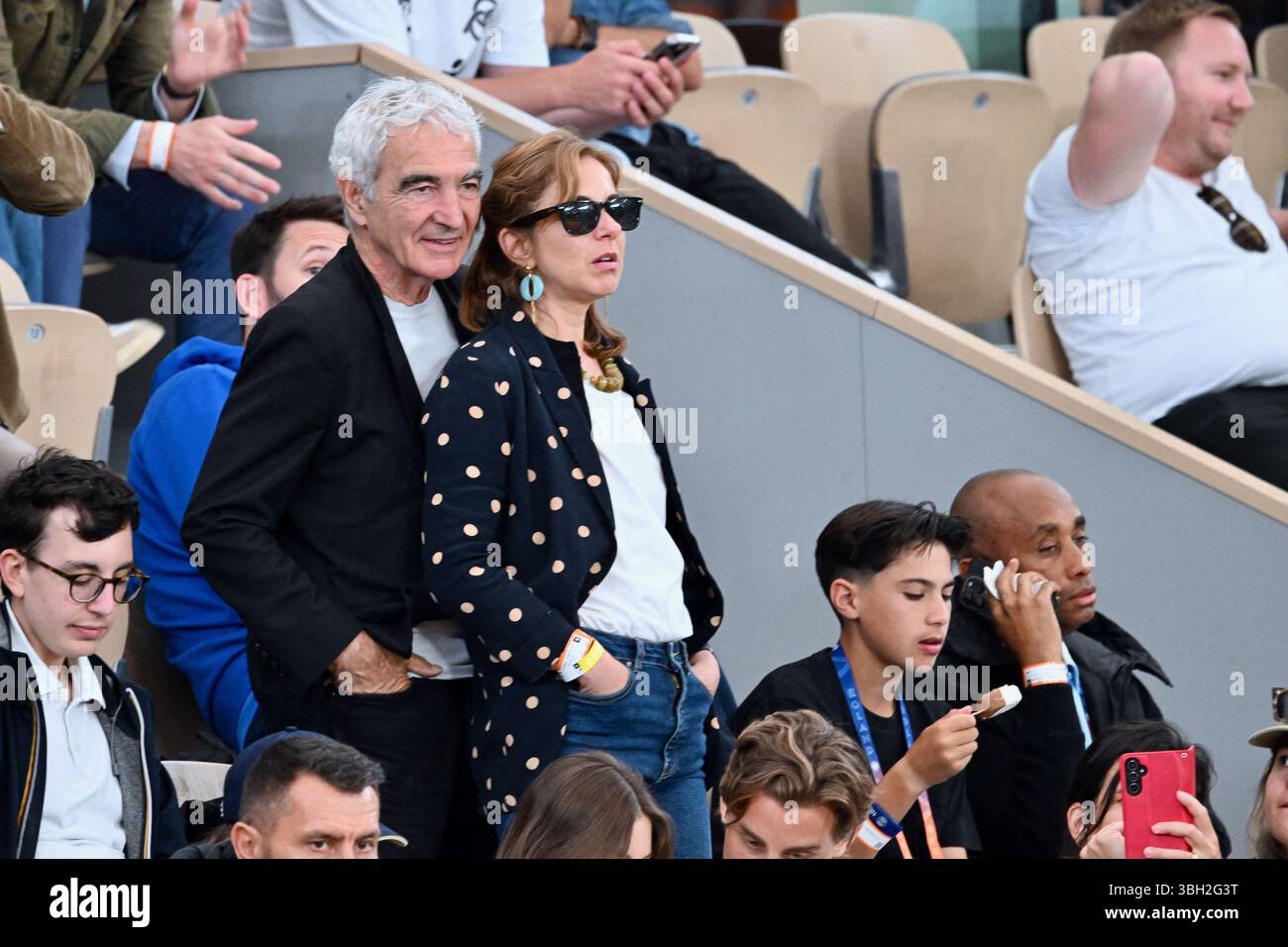 Raymond Domenech et sa nouvelle compagne seen in the stands during ...