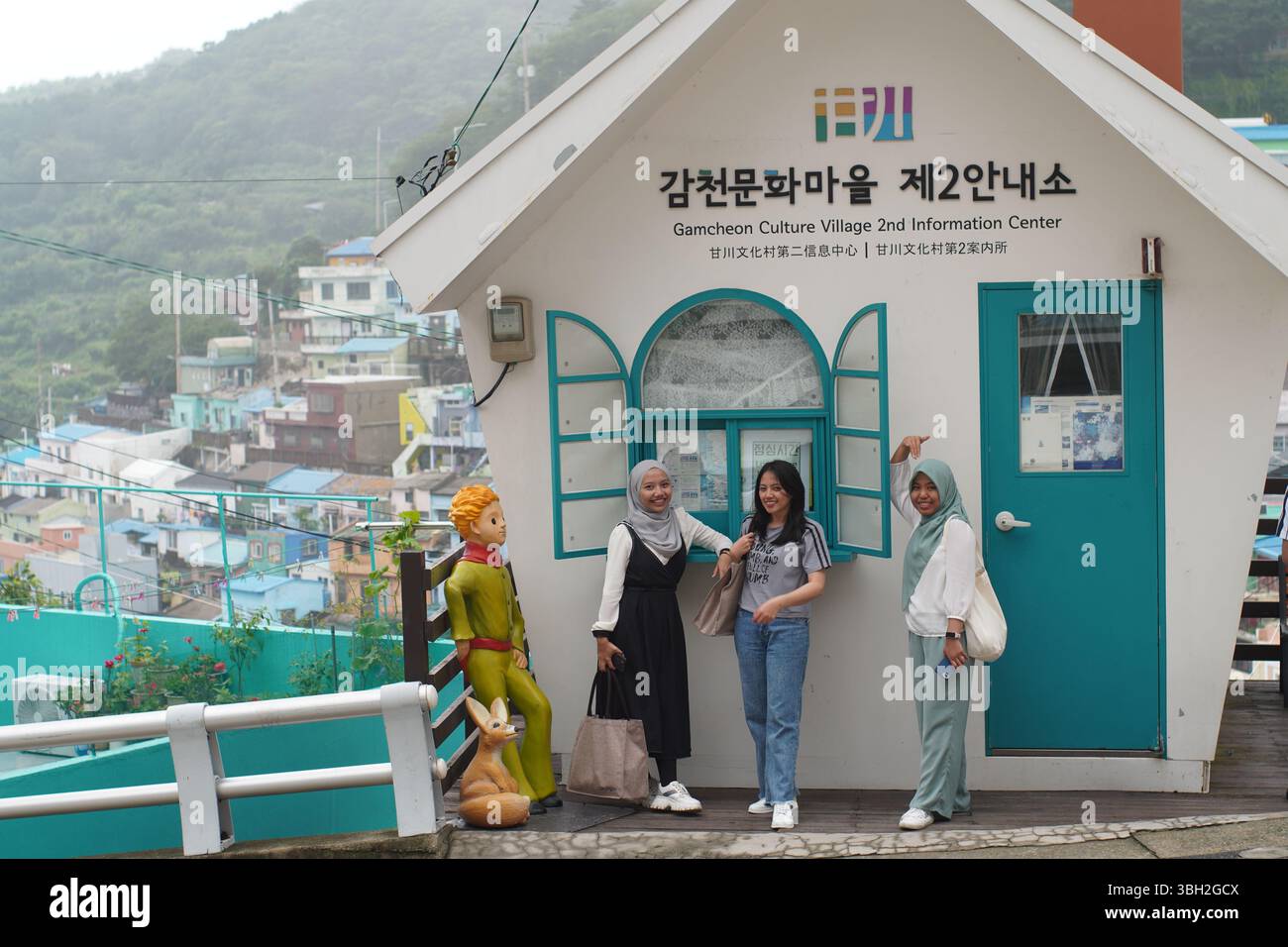 Gamcheon, 11 Apr 2019: Tourists happily in front of the Gamcheon ...