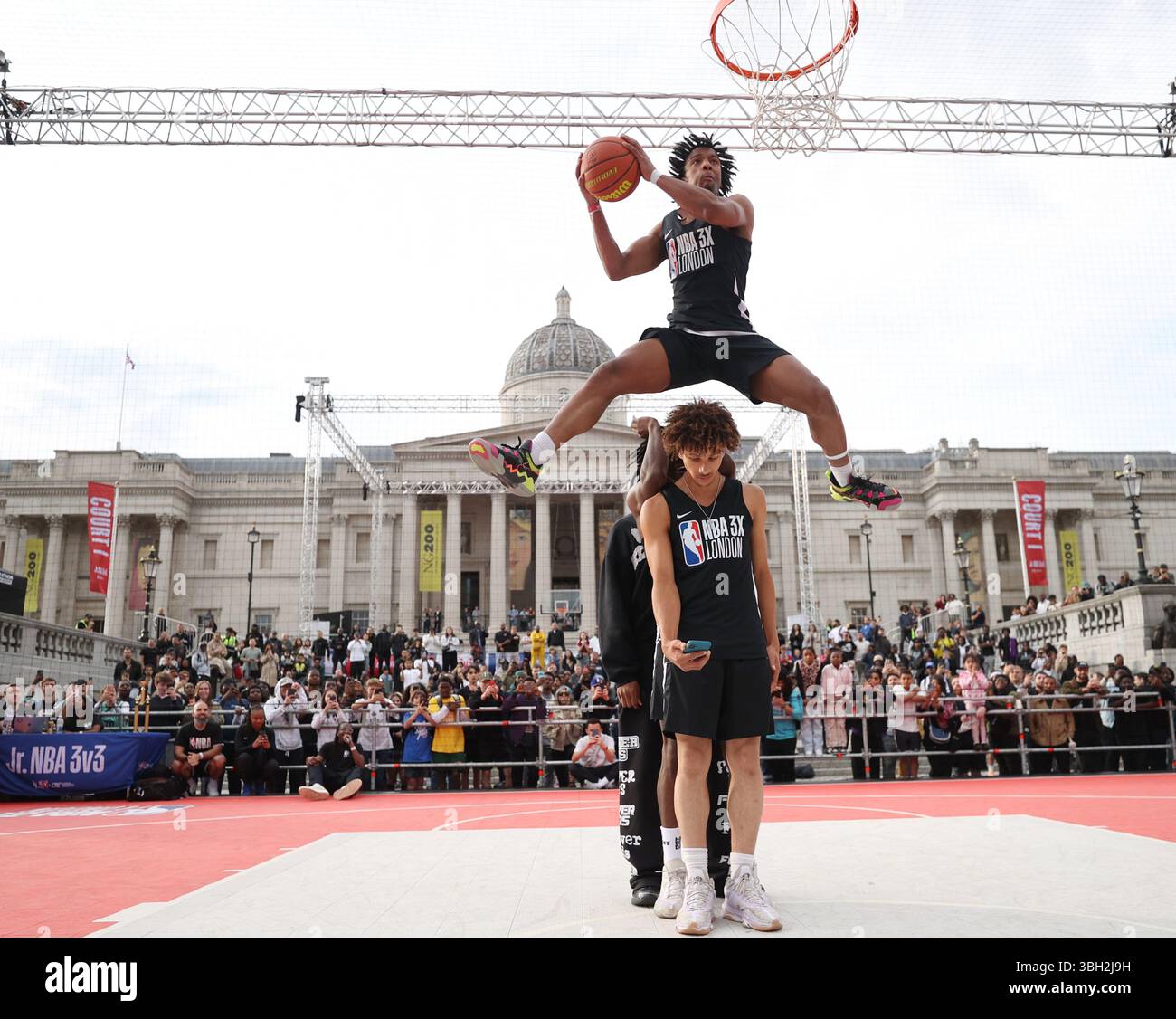 London, Britain. 6th June, 2025. Claudor Matoko (Top) performs at the ...