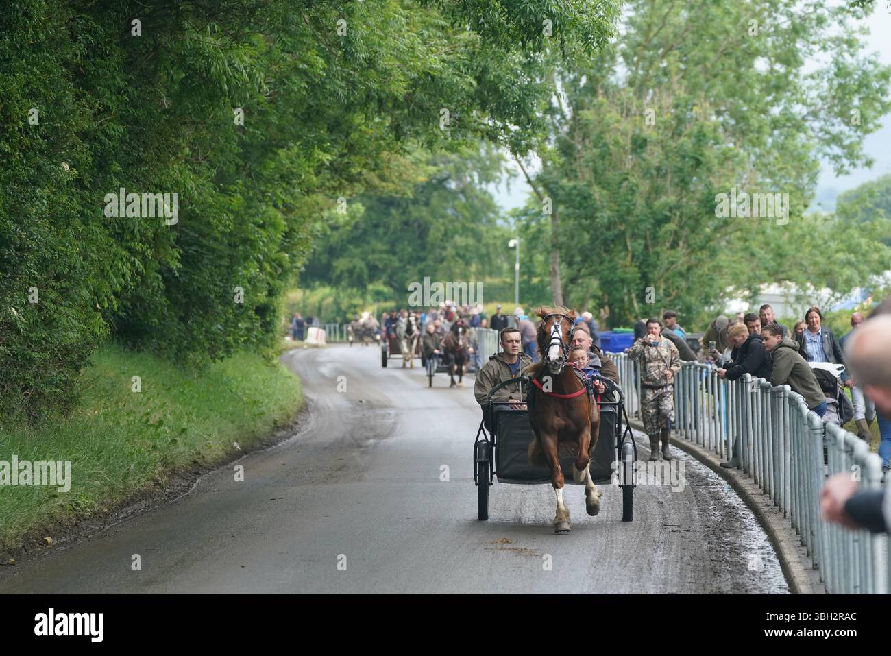 People in horse drawn carriages during the Appleby Horse Fair, the ...