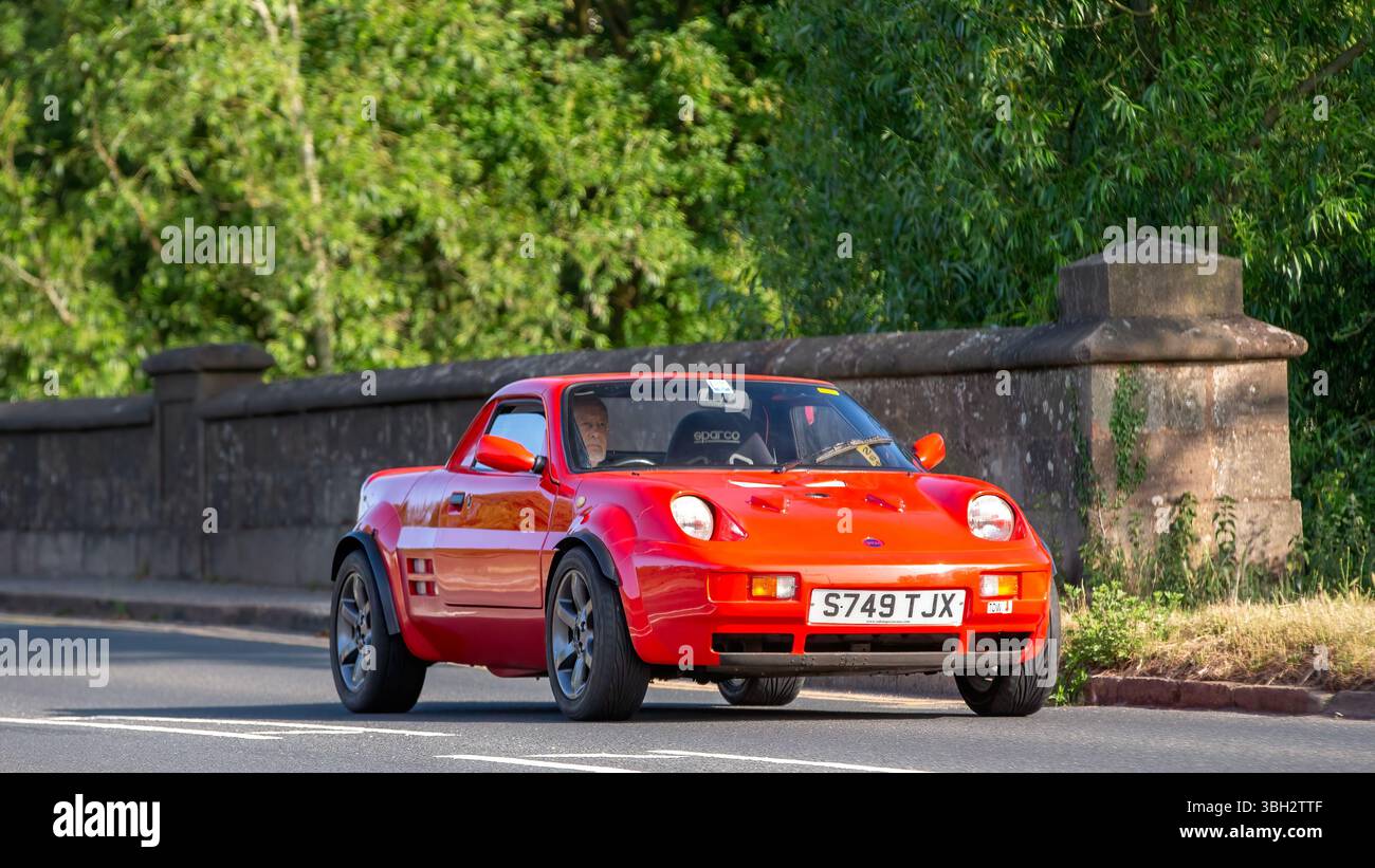 Milton Keynes,Bucks,UK - June 1st 2025: 1999 red GTM K3 car driving on ...