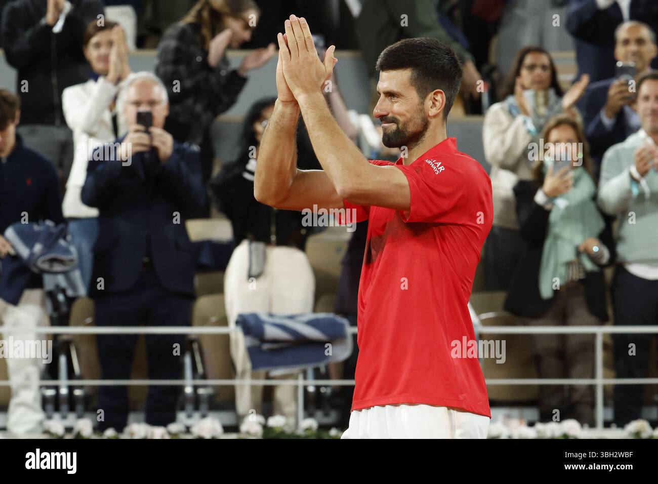 Novak Djokovic of Serbia says goodbye to the fans after his defeat ...