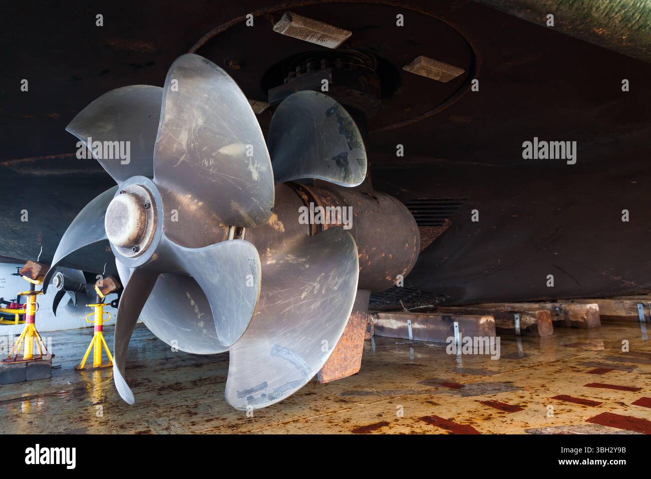 The bottom of a ship supported in dry dock with azimuth propulsion and ...