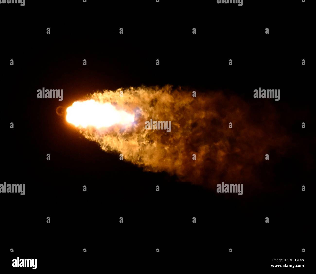 The SpaceX Falcon 9 rocket creates a contrail as it goes supersonic ...