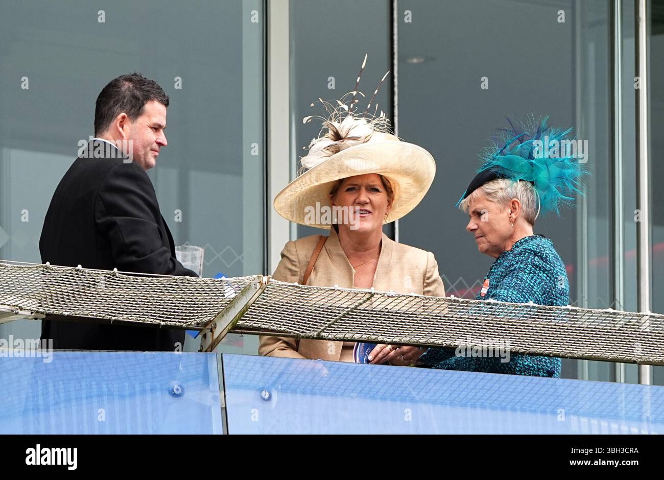 Clare Balding (centre) watches the the Princess Elizabeth Stakes during ...