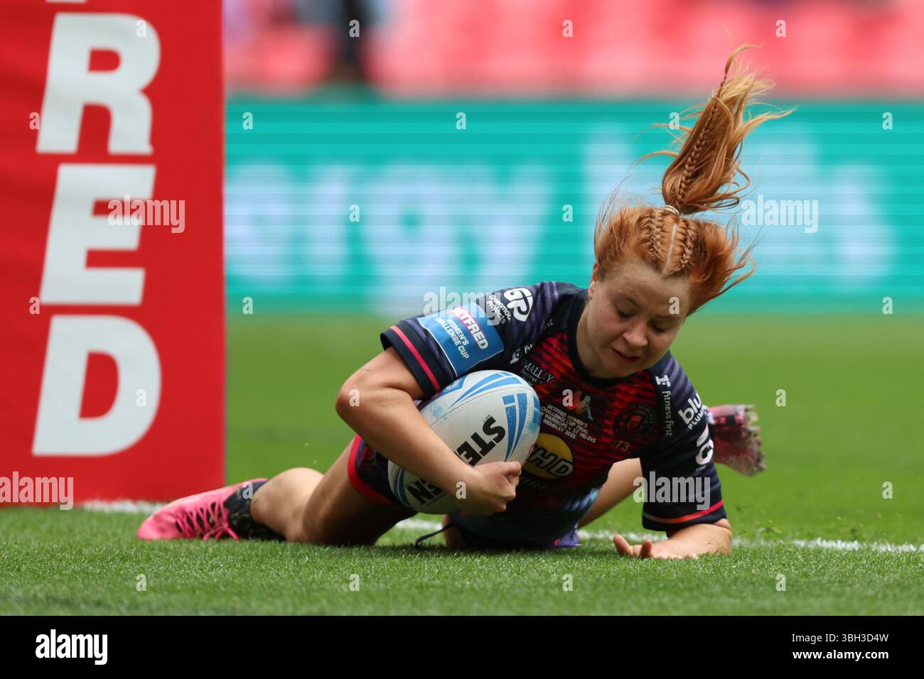 Wigan Warriors' Grace Banks scores a try during the Women's Challenge ...