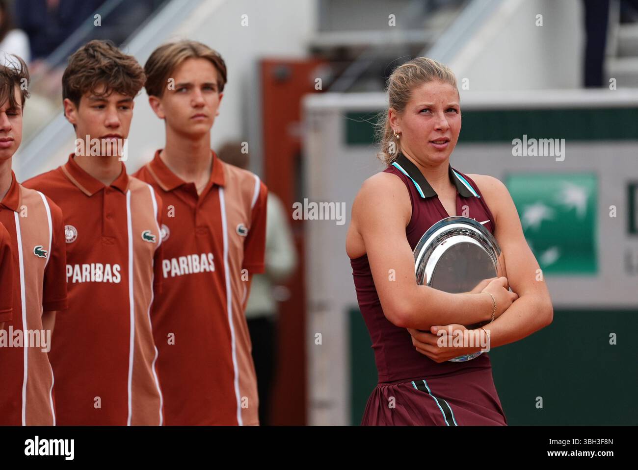 Second placed Great Britain's Hannah Klugman holds the trophy after the ...