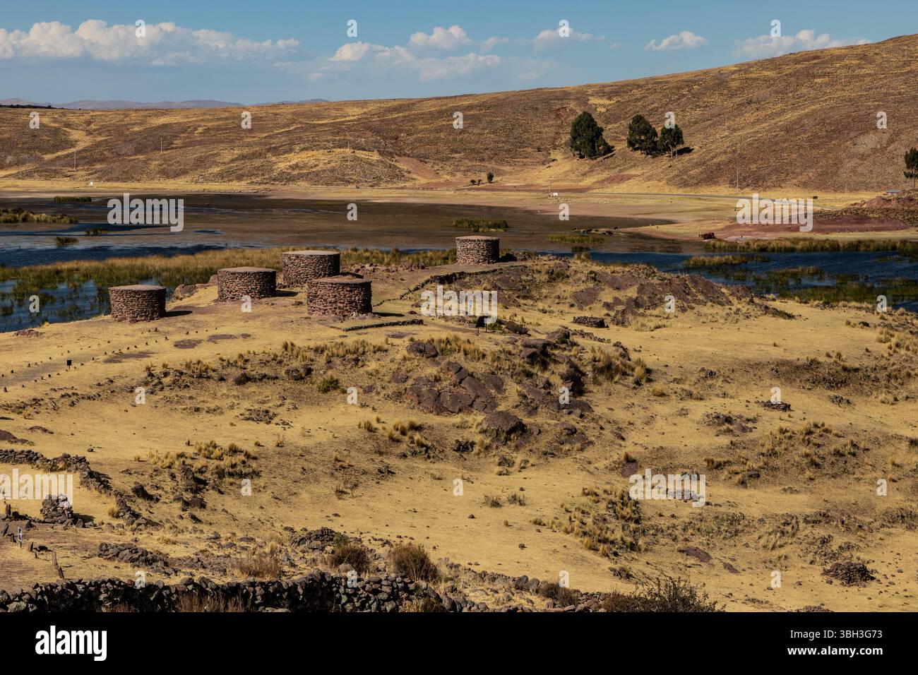 Sillustani funerary towers in Peru Stock Photo - Alamy