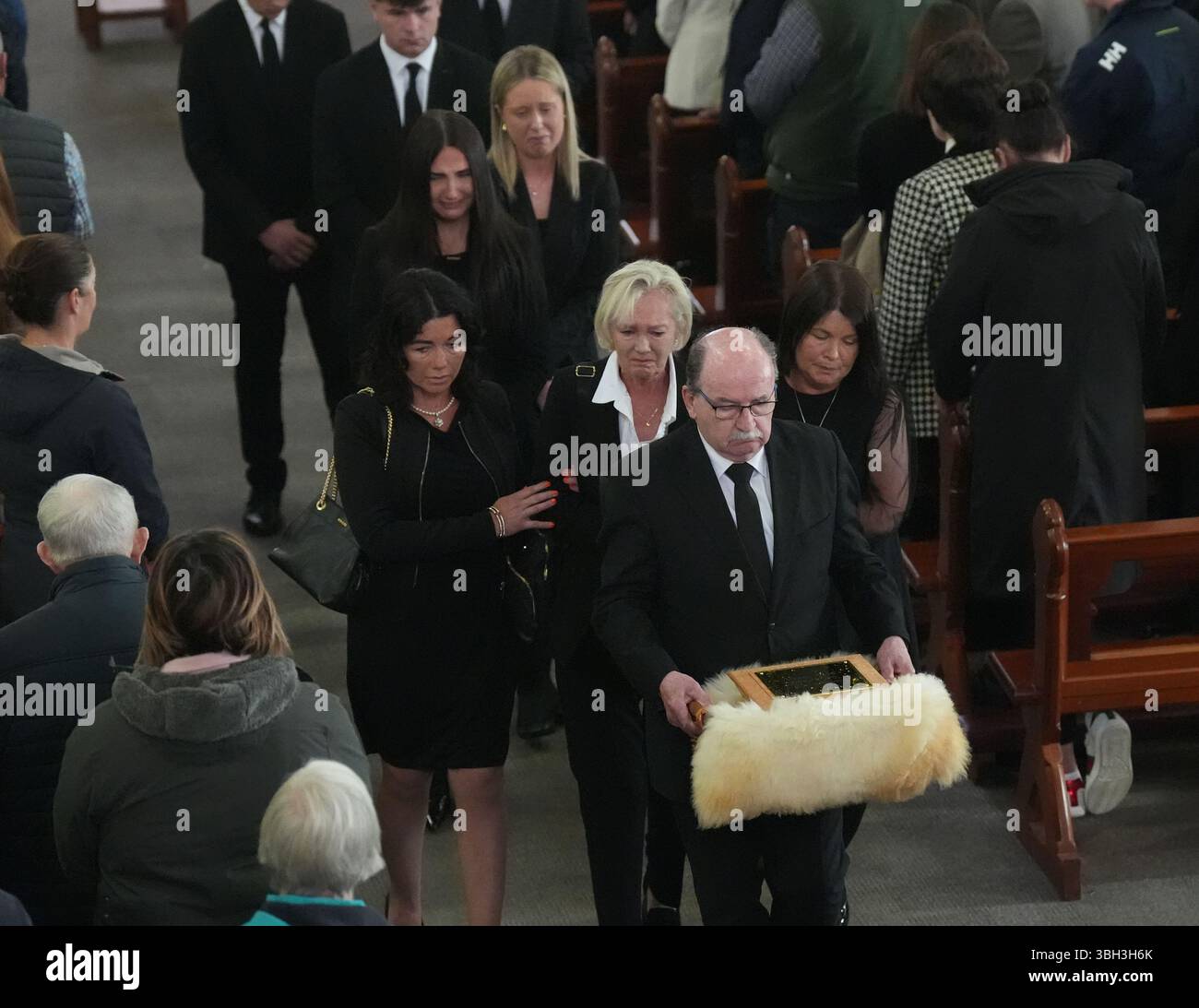 Michael Gaines widow Janice is consoled by family members leaving the ...