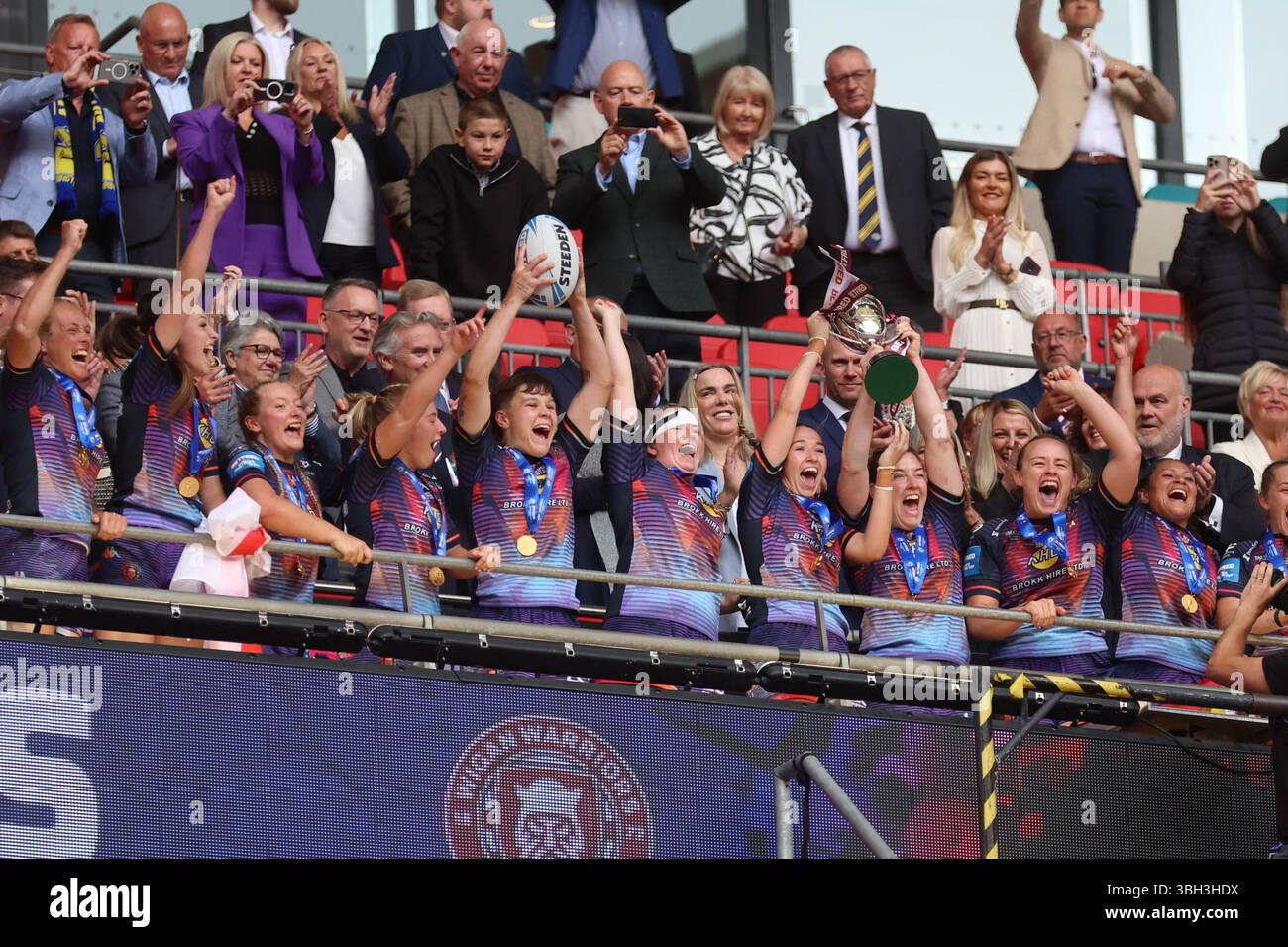 Wigan Warriors' Victoria Molyneux (centre, left) and Wigan Warriors ...