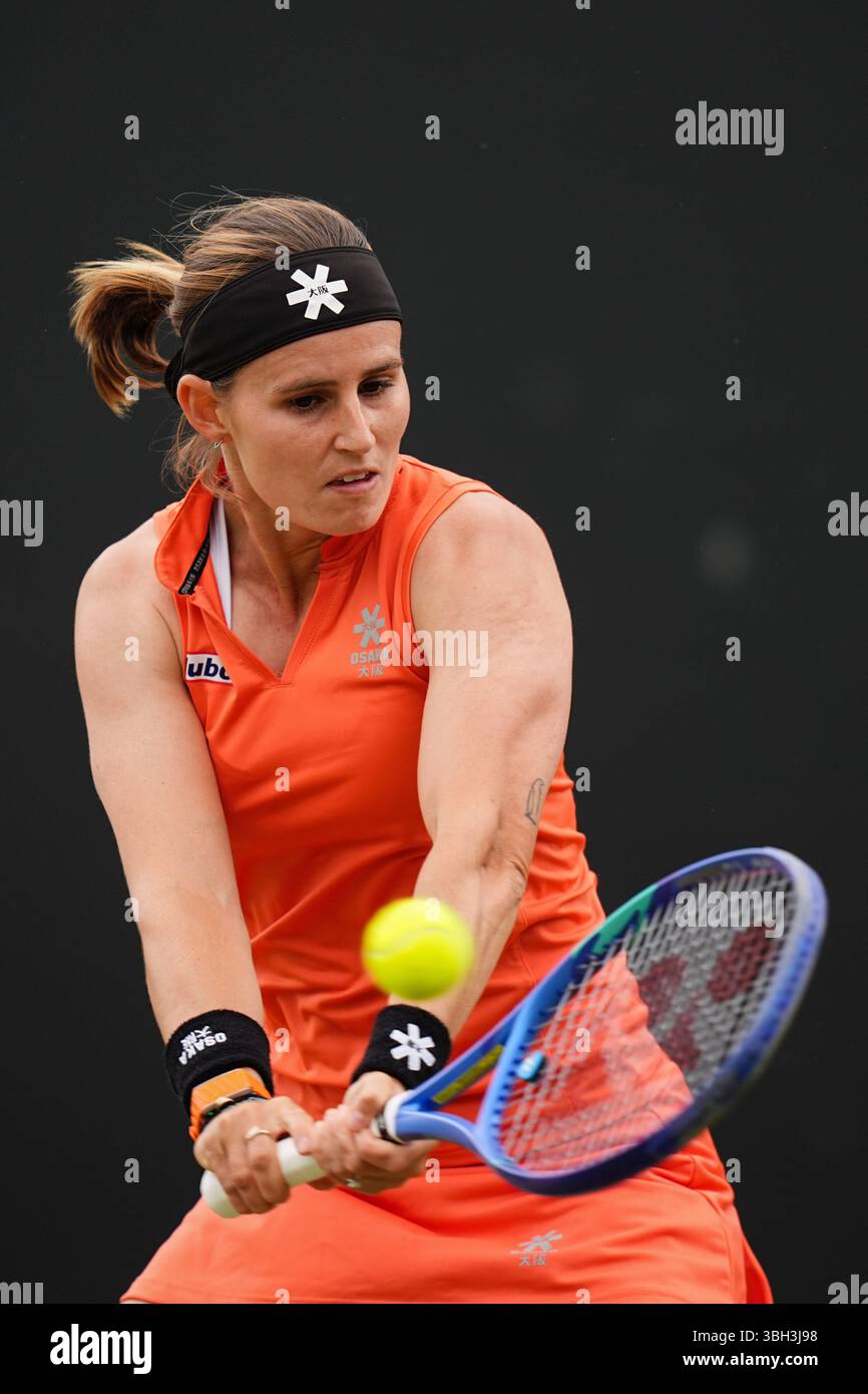 Greet Minnen in action during her match against Kimberly Birrell on day ...