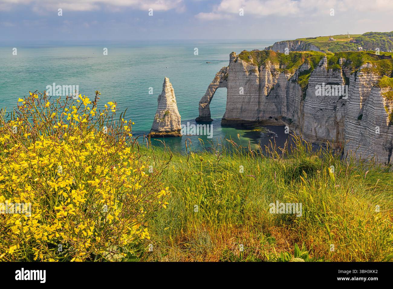 A sunny springtime day with the view from the cliffs of Etretat ...