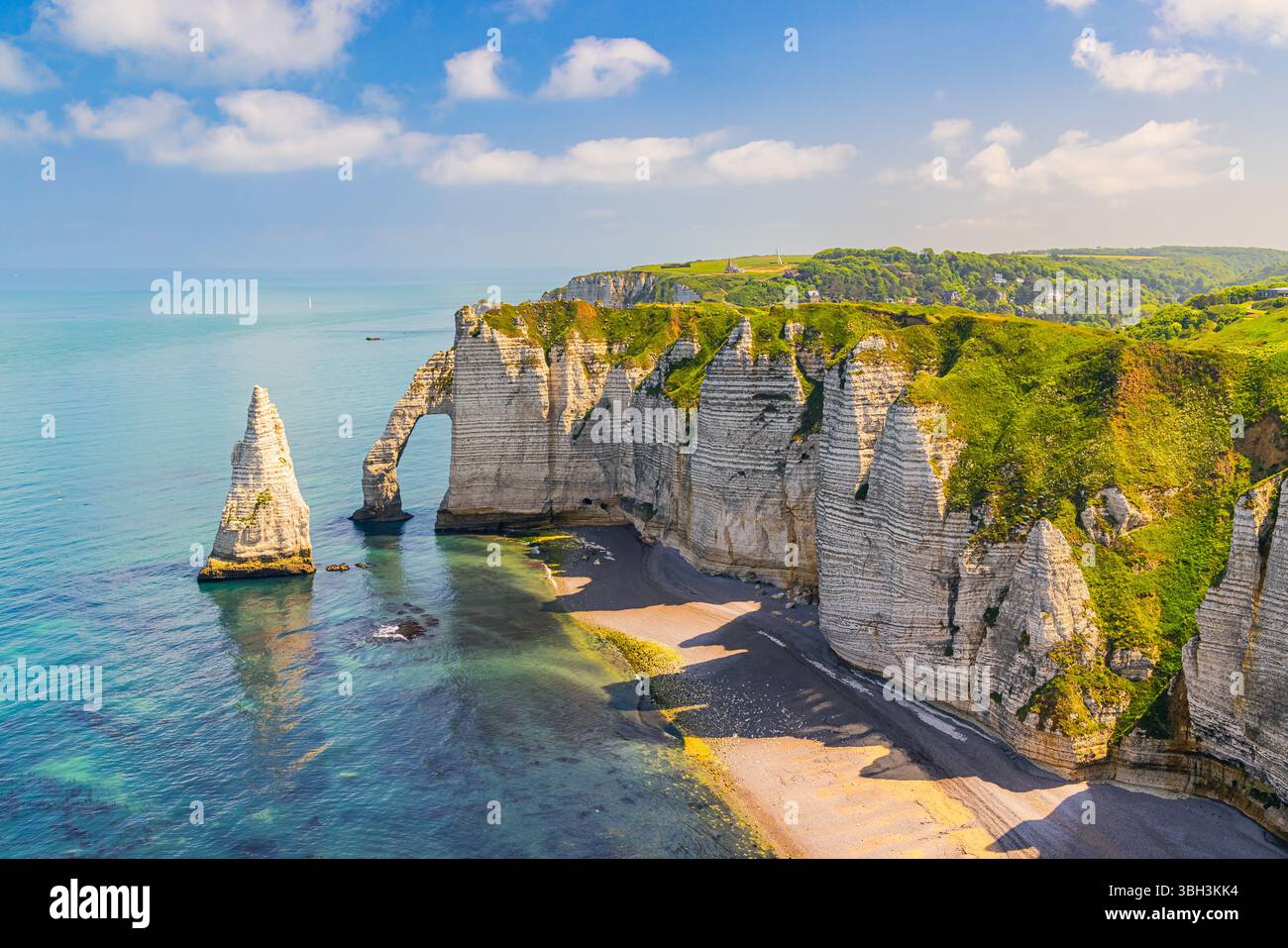 A sunny springtime day with the view from the cliffs of Etretat ...