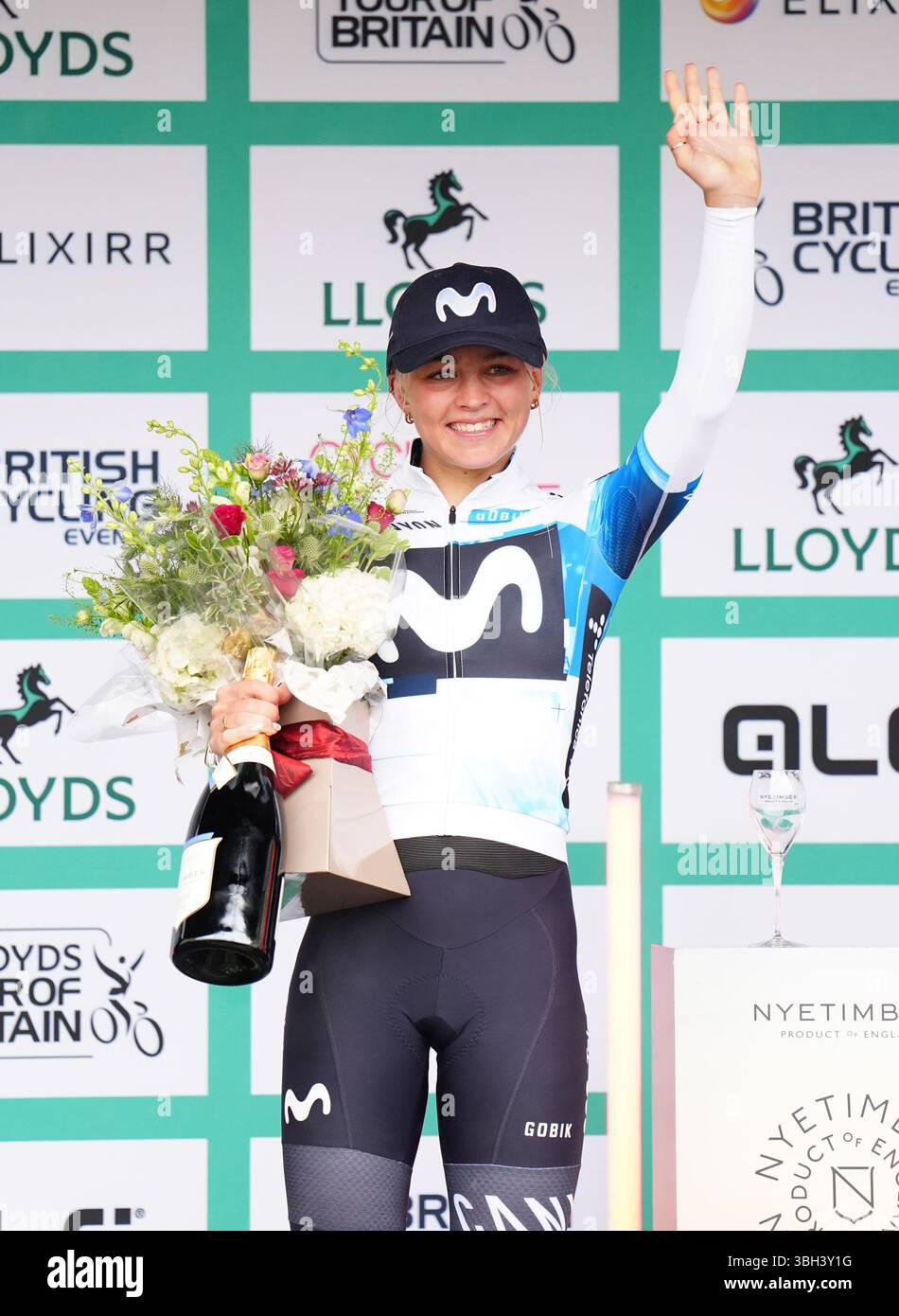 Cat Ferguson of Movistar Team celebrates on the podium after winning ...