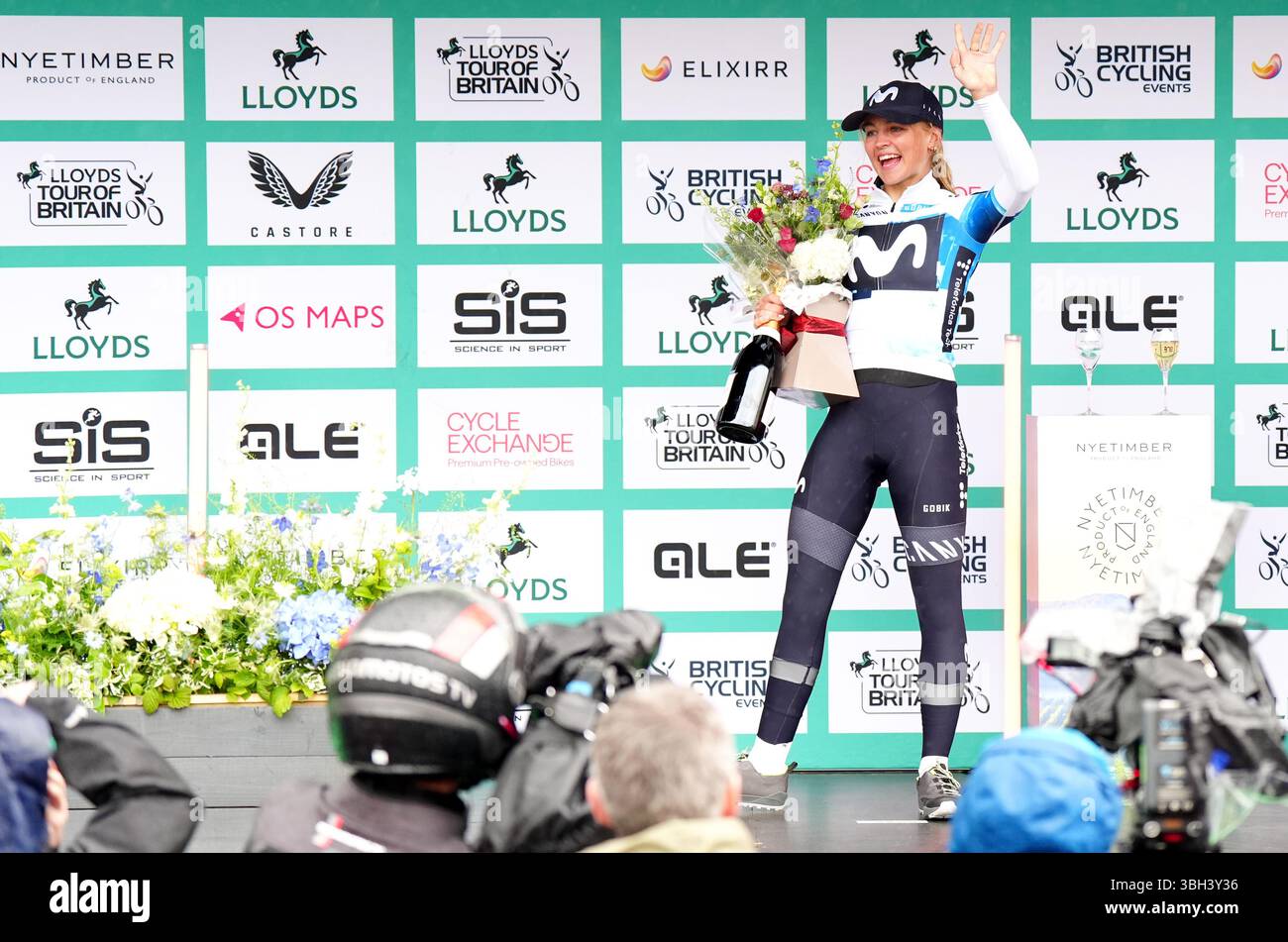 Cat Ferguson of Movistar Team celebrates on the podium after winning ...