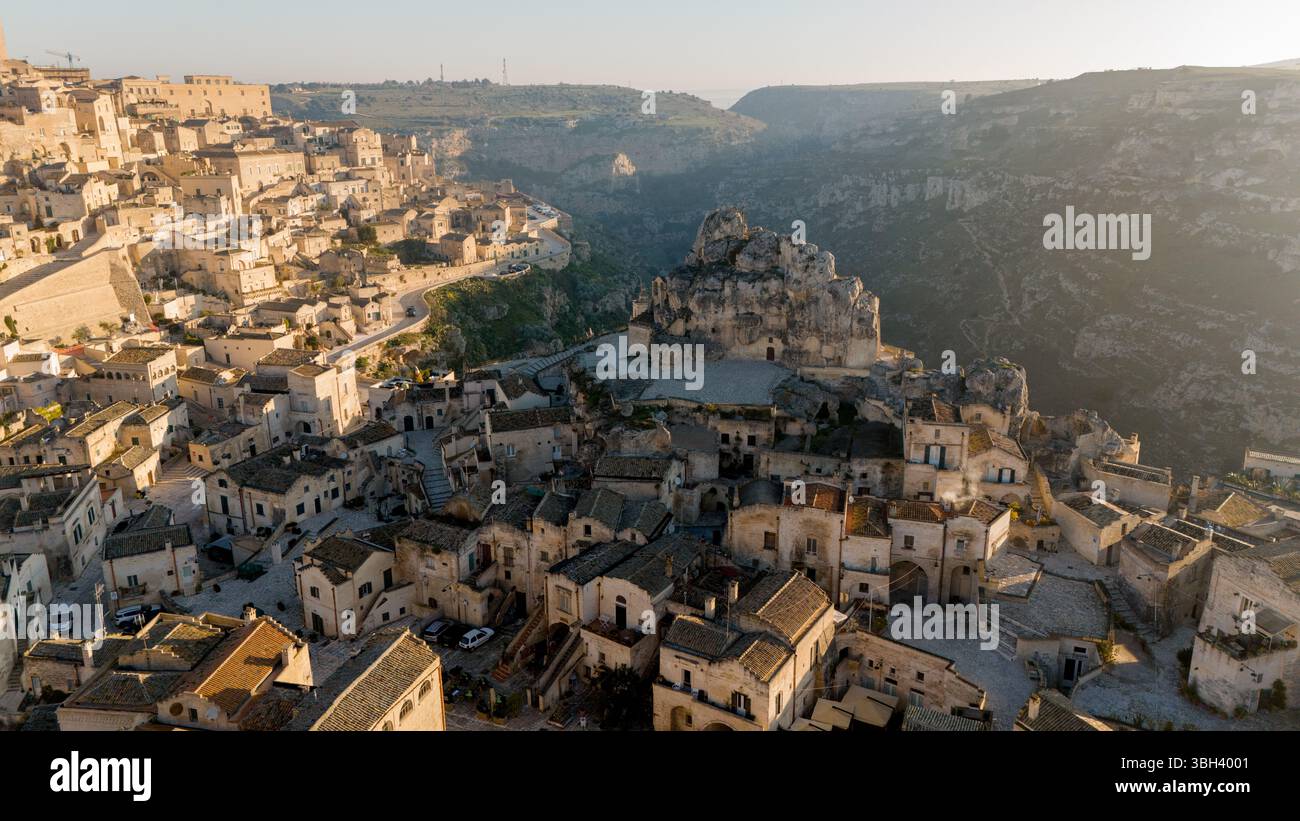 Drone view of Materas iconic rock-hewn church, Chiesa di Santa Maria di ...
