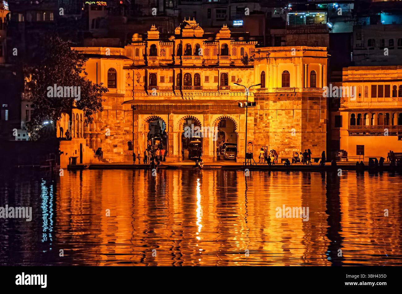 Night view of the old city of Udaipur across the Pichola Lake, Udaipur ...