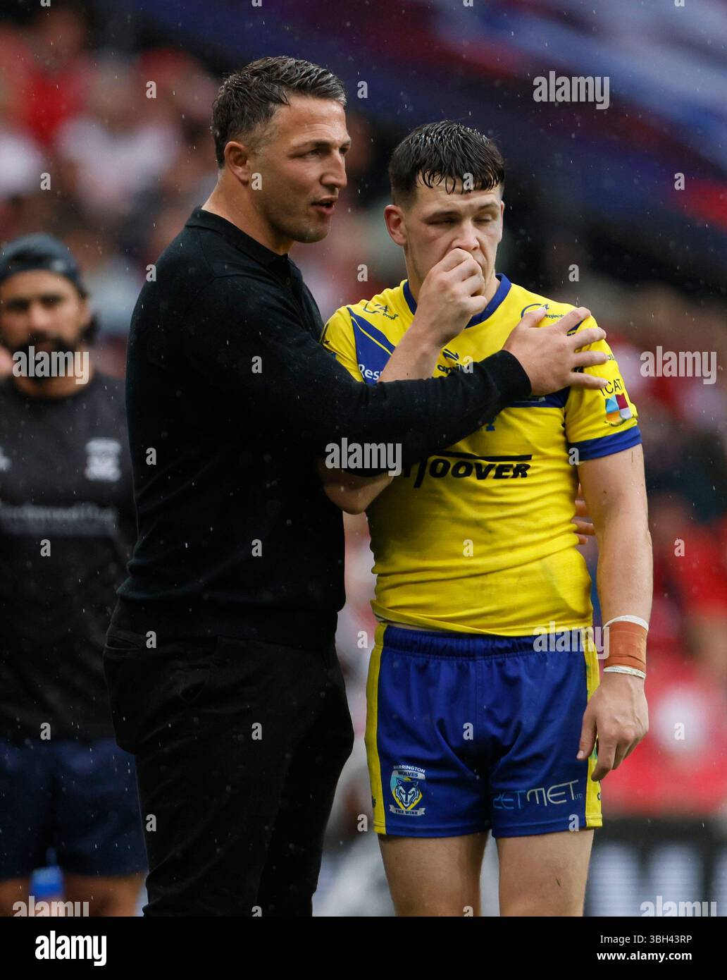 Warrington Wolves head coach Sam Burgess with Warrington Wolves' Josh Thewlis (right) during the ...