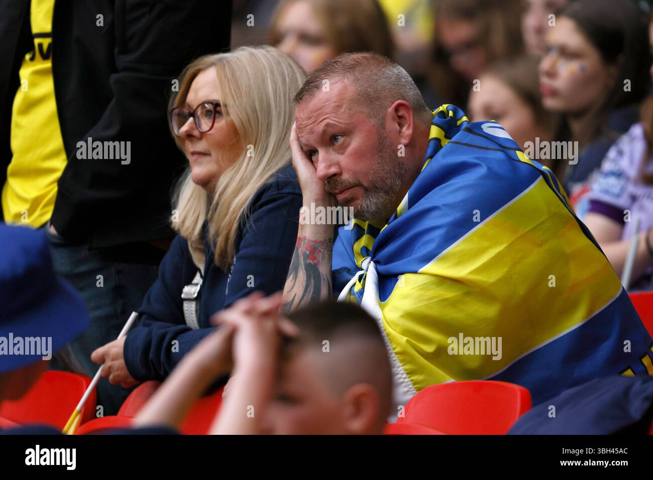 Warrington Wolves fans look dejected in the stands during the Challenge ...