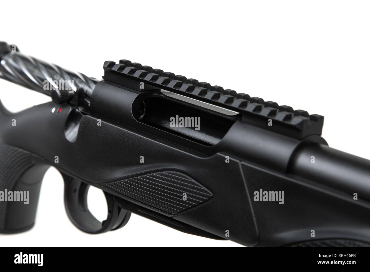 Close-up of a bolt-action rifle receiver with spiral fluted bolt and ...