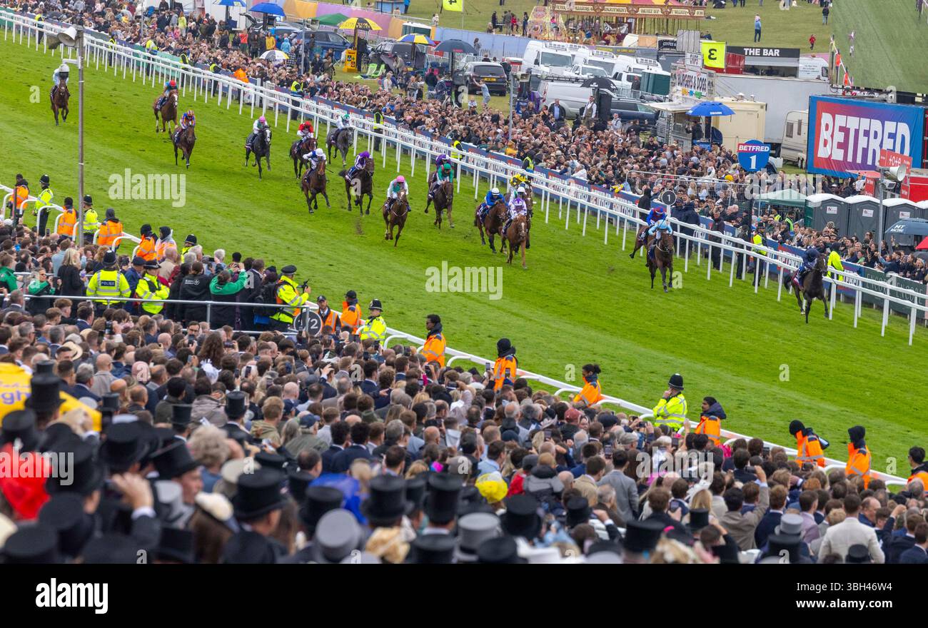 Epsom, UK. 7th June, 2025. Jockey Wayne Lordan leads with the Derby ...