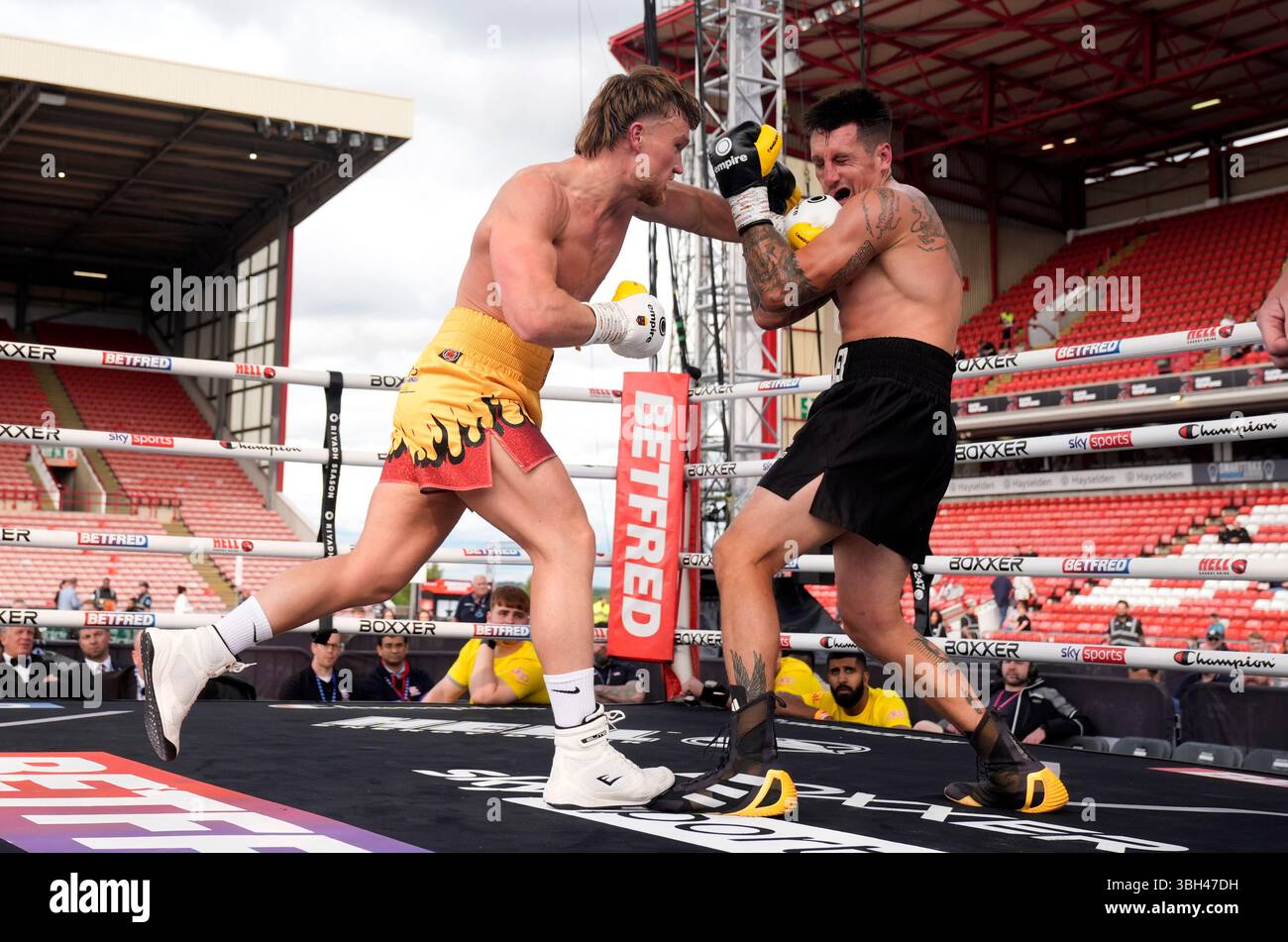 Harley Collison (right) in action against Red Johnson (left) at Oakwell ...