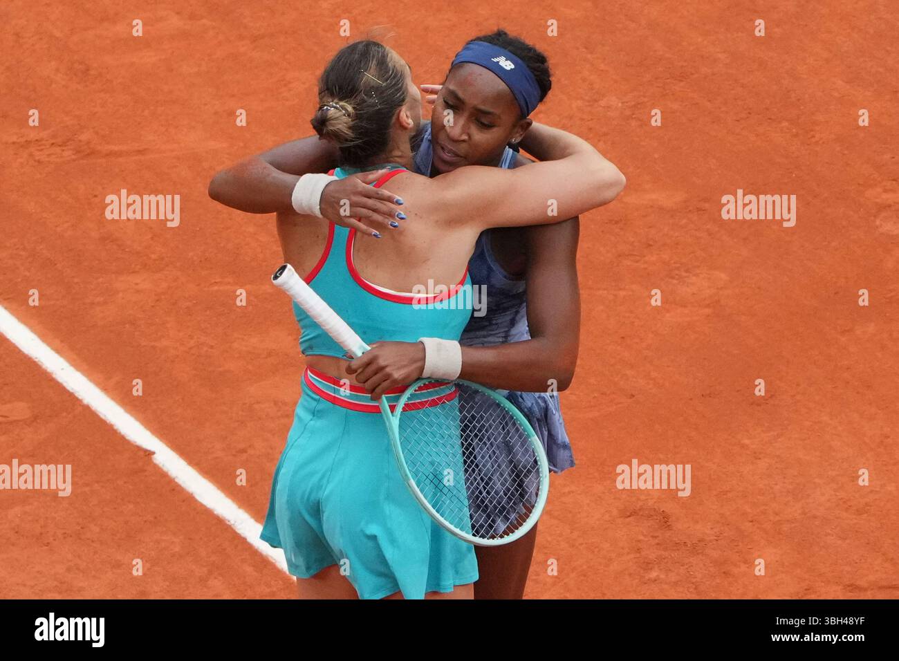 United States' Coco Gauff hugs Aryna Sabalenka of Belarusafter winng ...