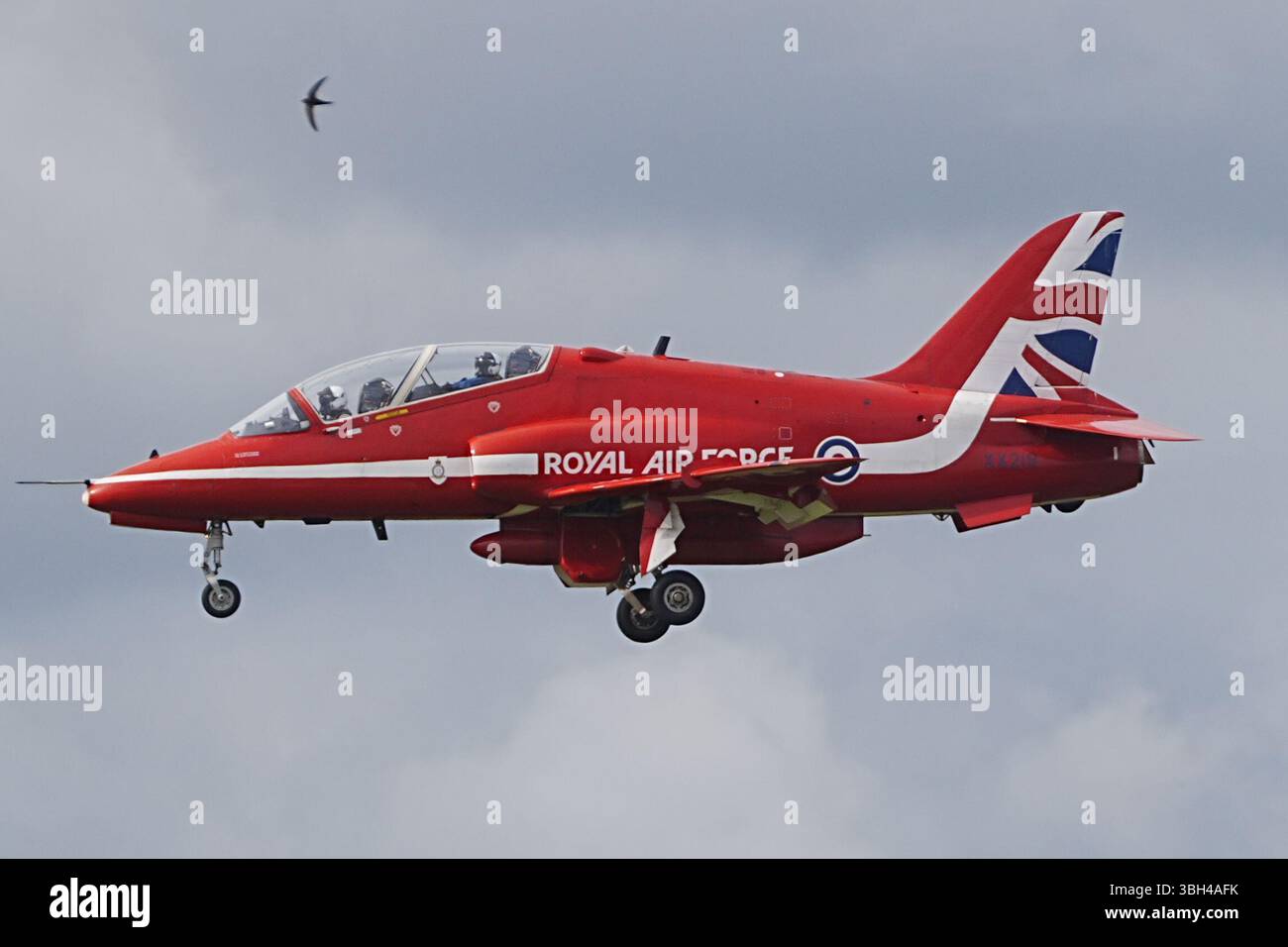One of the Red Arrows Hawk T1 jets comes in to land at Liverpool John ...