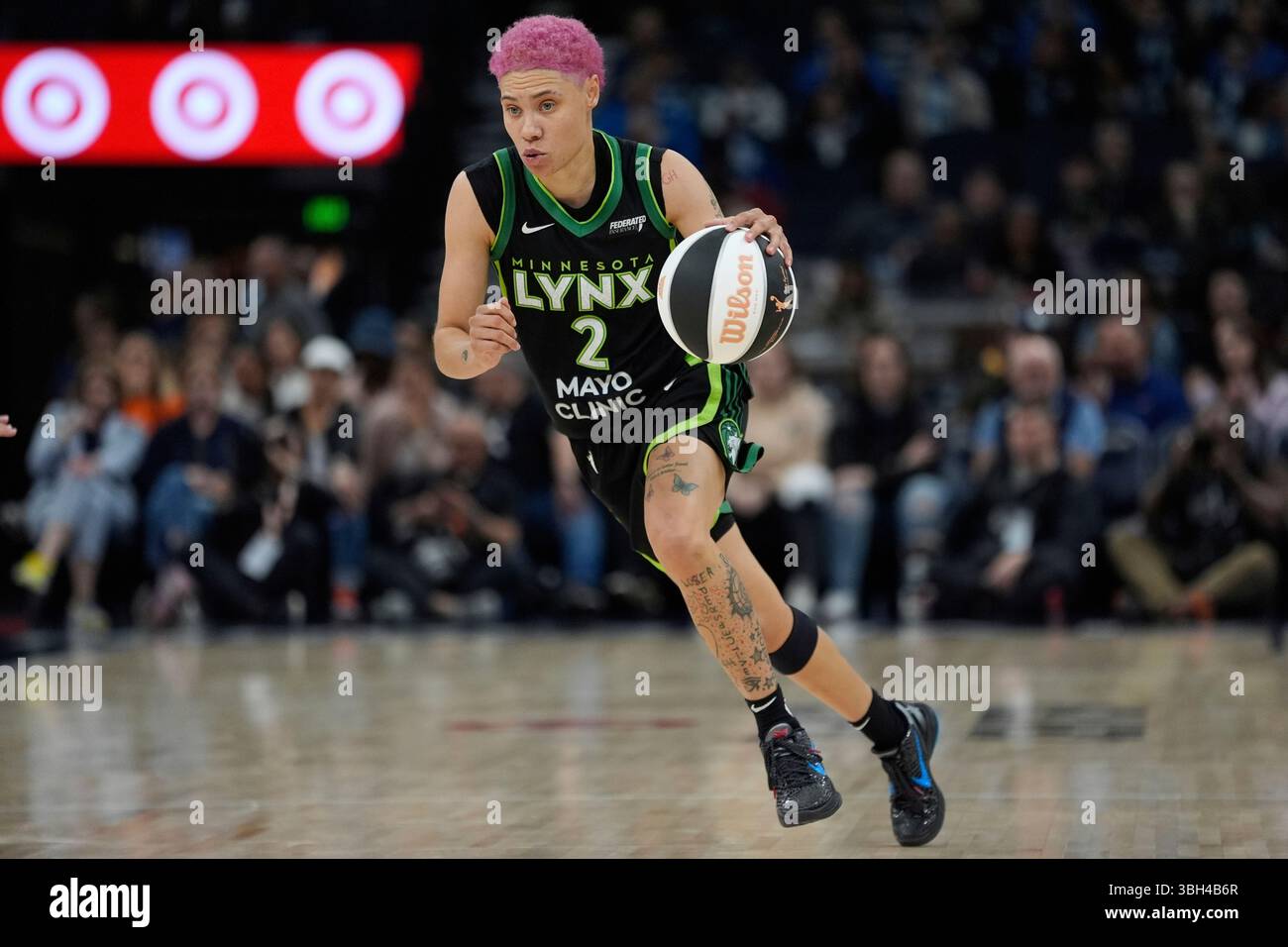 Minnesota Lynx guard Natisha Hiedeman (2) dribbles down the court ...