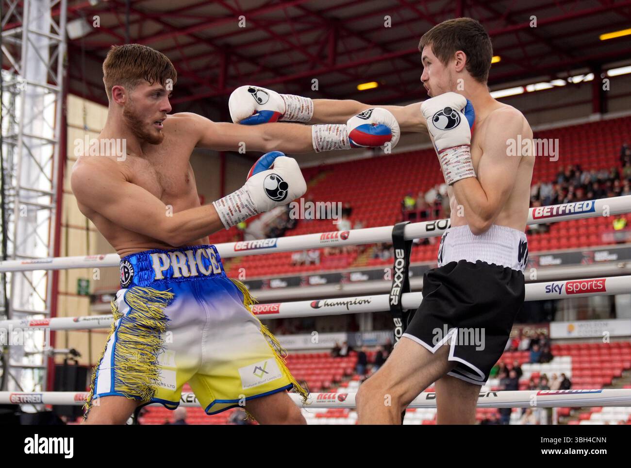 Ellis Price (left) in action against Jake Price (right) at Oakwell ...