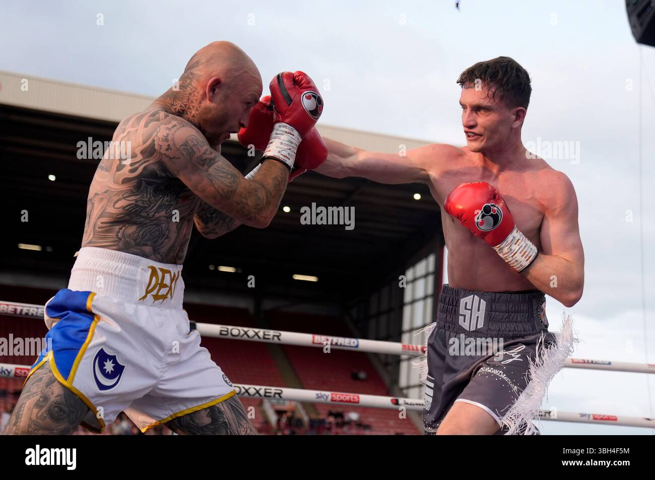 Sam Hickey (right) in action against Harley Hodgetts (left) at Oakwell ...