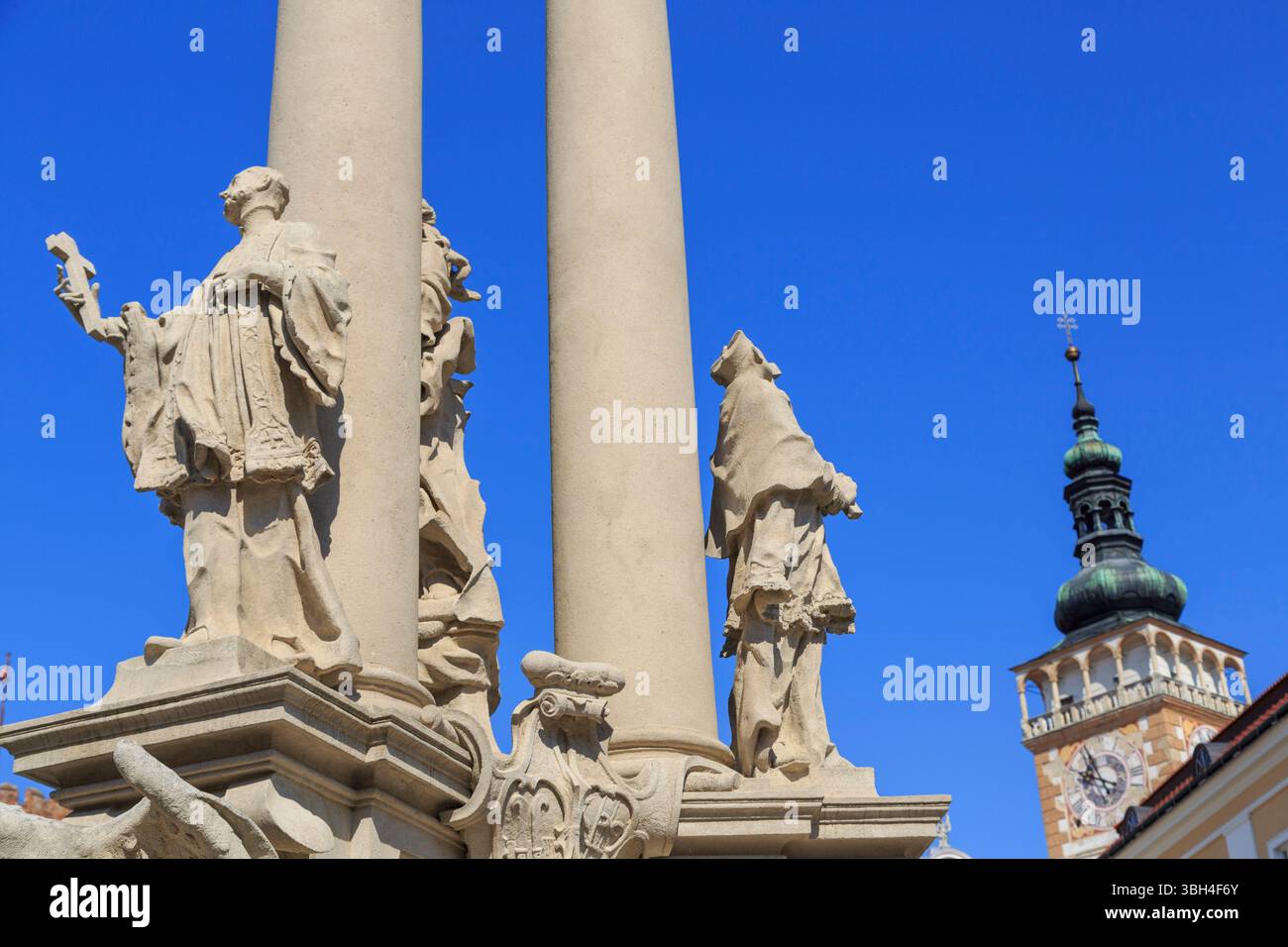 Statue of the Holy Trinity, Sousoší Nejsvětější trojice, with the clock ...