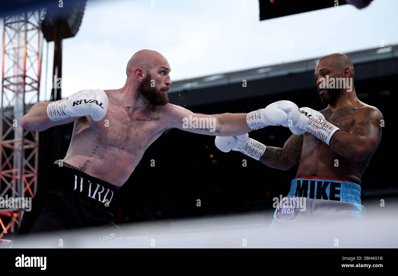 Steven Ward (left) in action against Mike Perez (right) at Portman Road Stadium, Ipswich ...