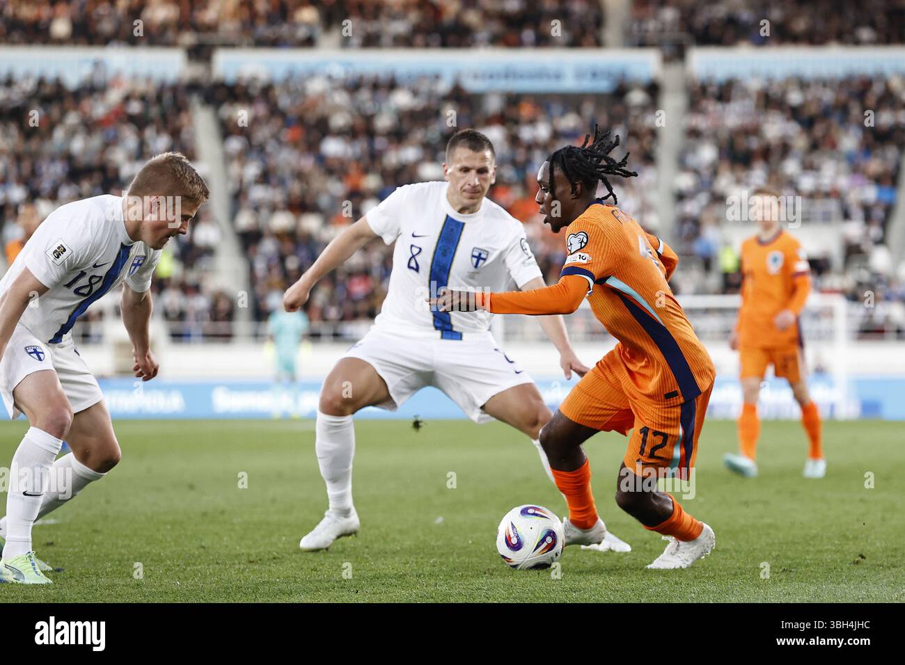 HELSINKI - (L-R) Jere Uronen of Finland, Robin Lod of Finland, Jeremie ...