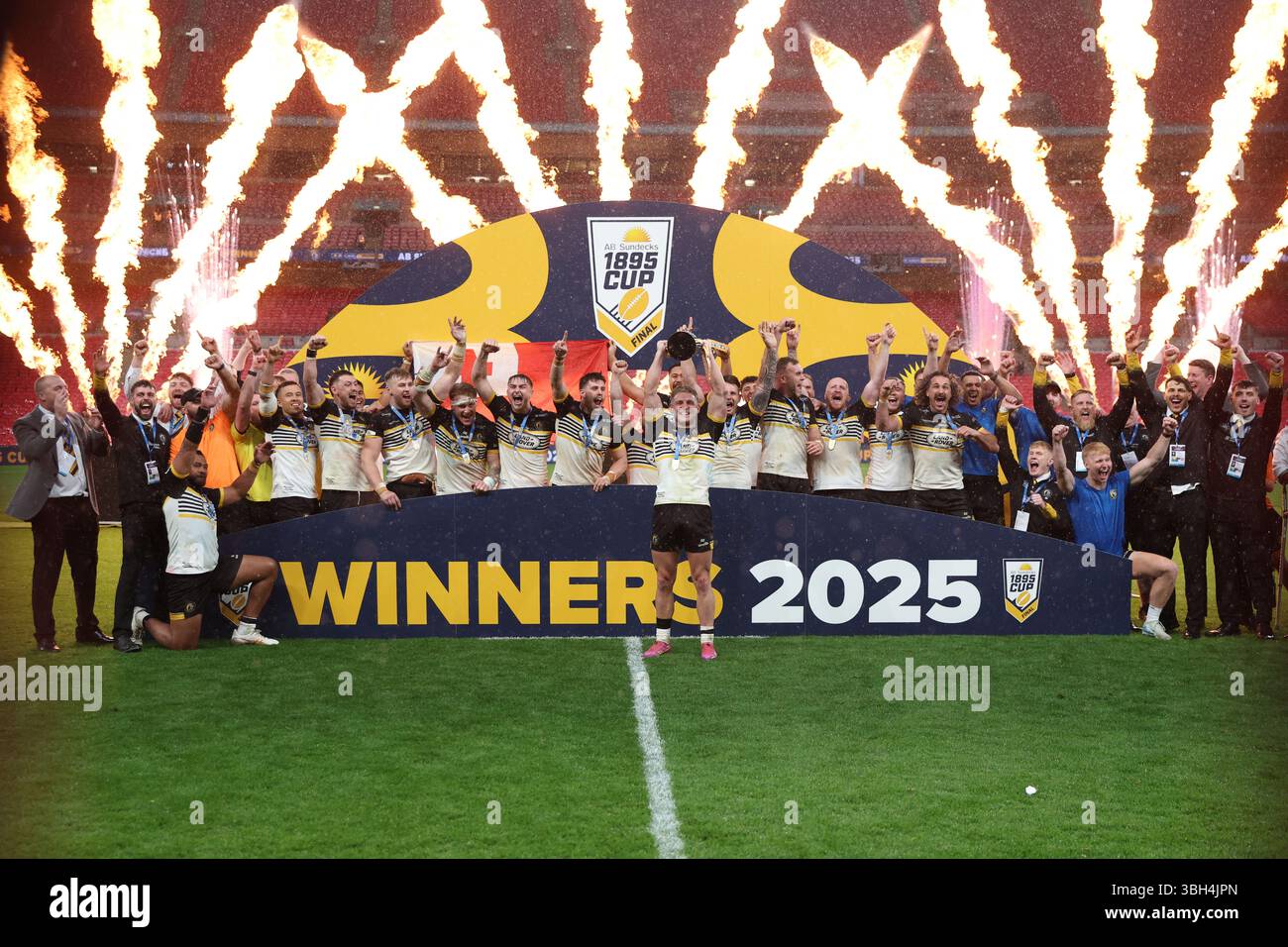 York Knights' Liam Harris (centre) celebrates with the trophy and team ...