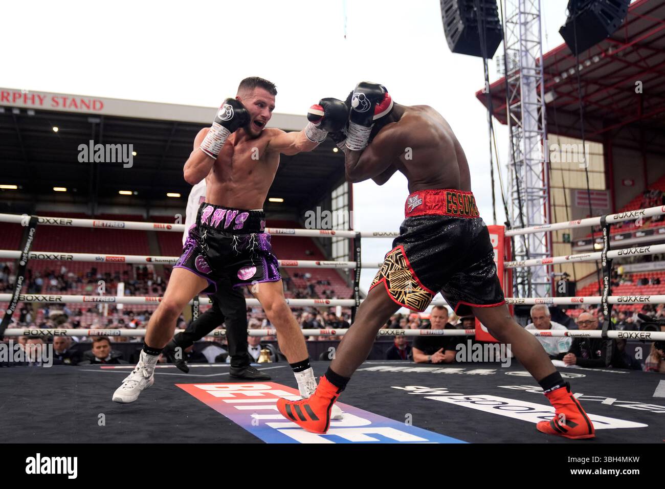 Rhys Edwards (left) in action against Thomas Essomba (right) at Oakwell ...