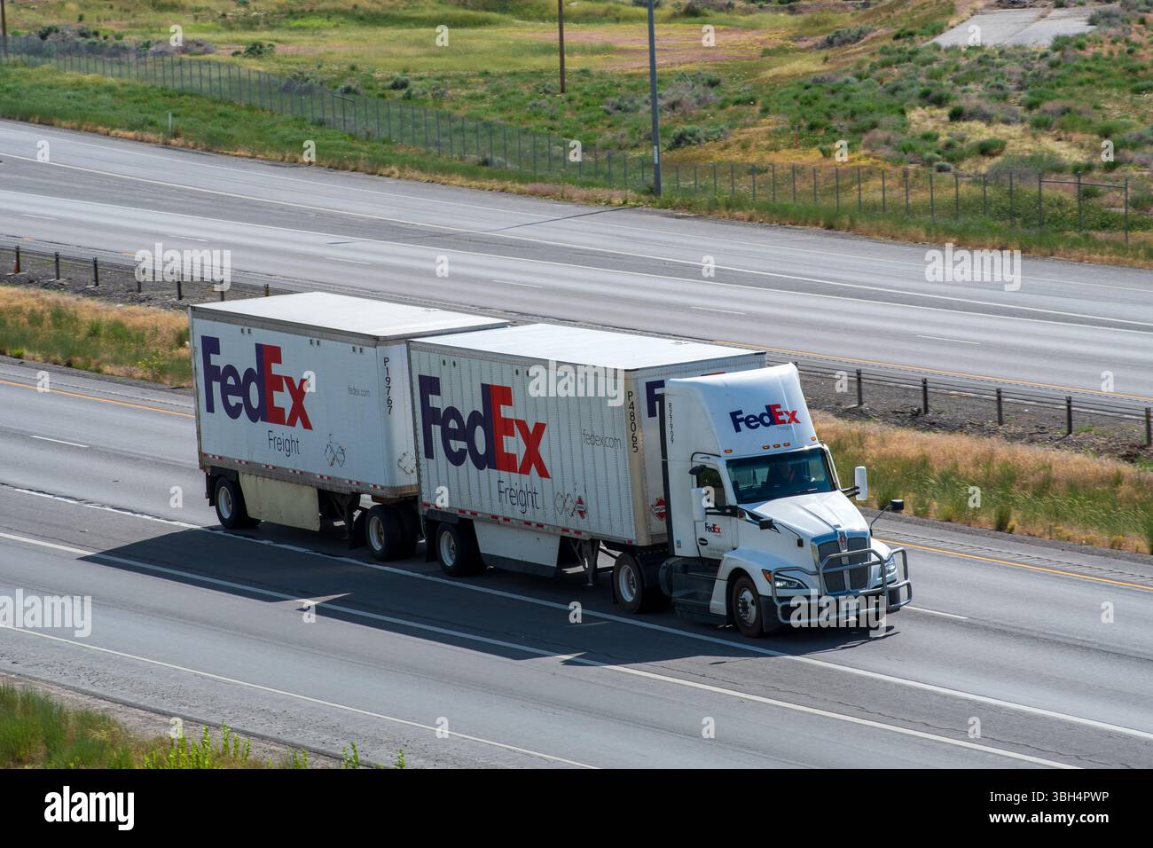 Truck drives shipping containers hi-res stock photography and images ...