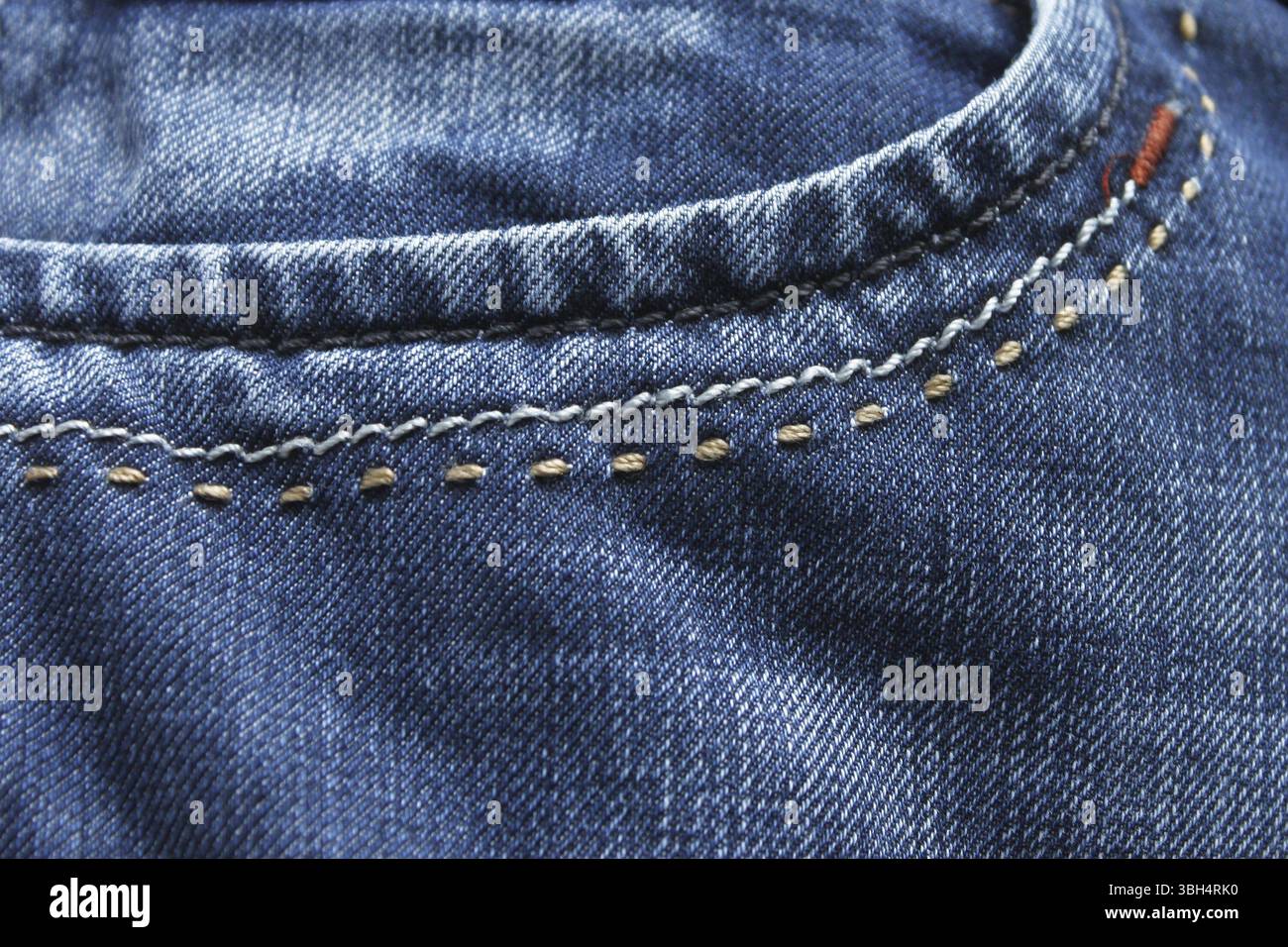 Detail clothes with blue jeans fabric close up Stock Photo - Alamy