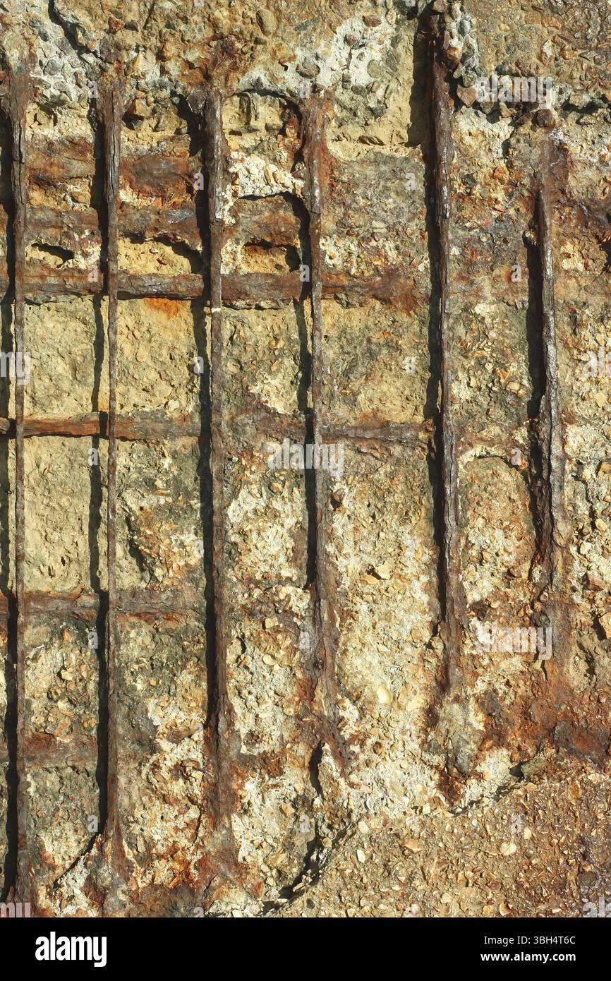 Detail of old outdated reinforced concrete structures with rusty iron ...