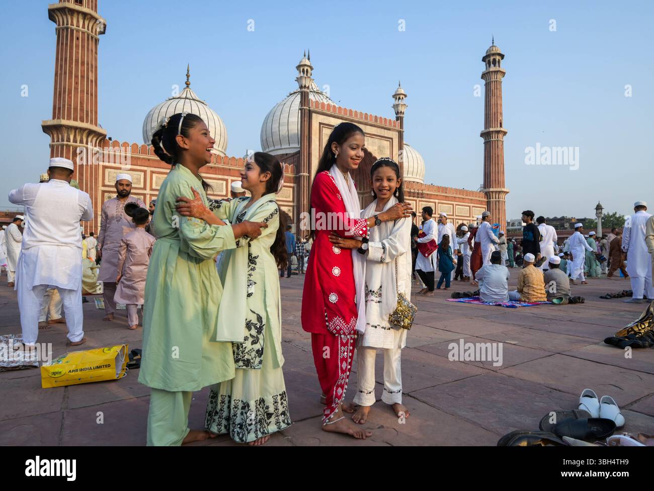 NEW DELHI, INDIA - JUNE 7: Muslims embrace after offering Eid al-Fitr ...