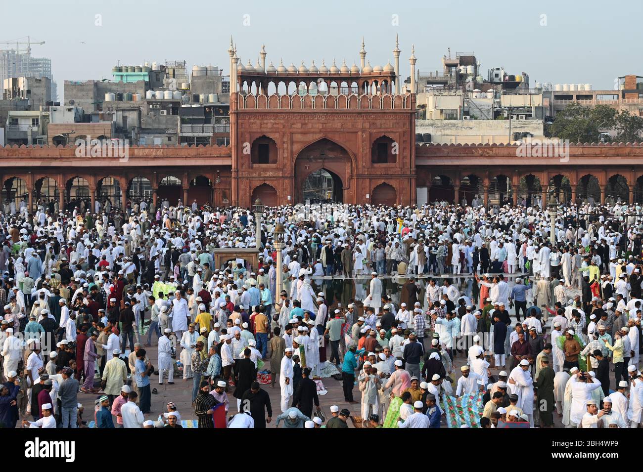 NEW DELHI, INDIA - JUNE 7: Muslims greet after offering Namaz at ...
