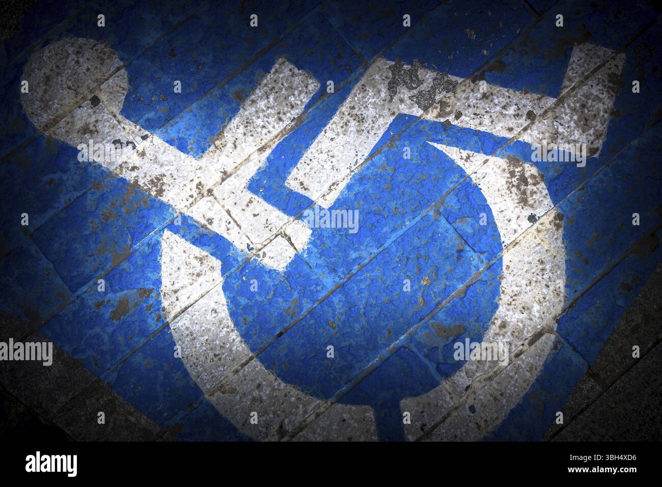 Disability symbol painted on the floor Stock Photo - Alamy