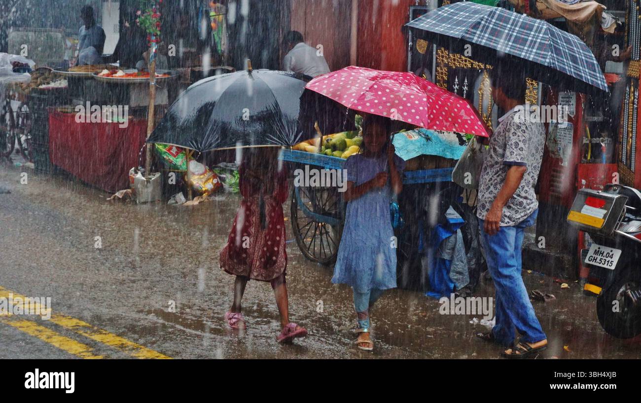 MUMBAI, INDIA - JUNE 7: People stuck during heavy rains in Thane city ...