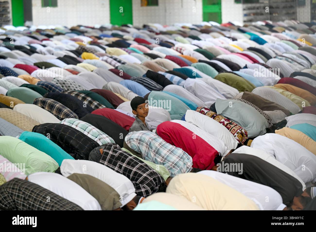 NOIDA, INDIA - JUNE 7: Muslims offer prayer (namaz) on the occasion of ...