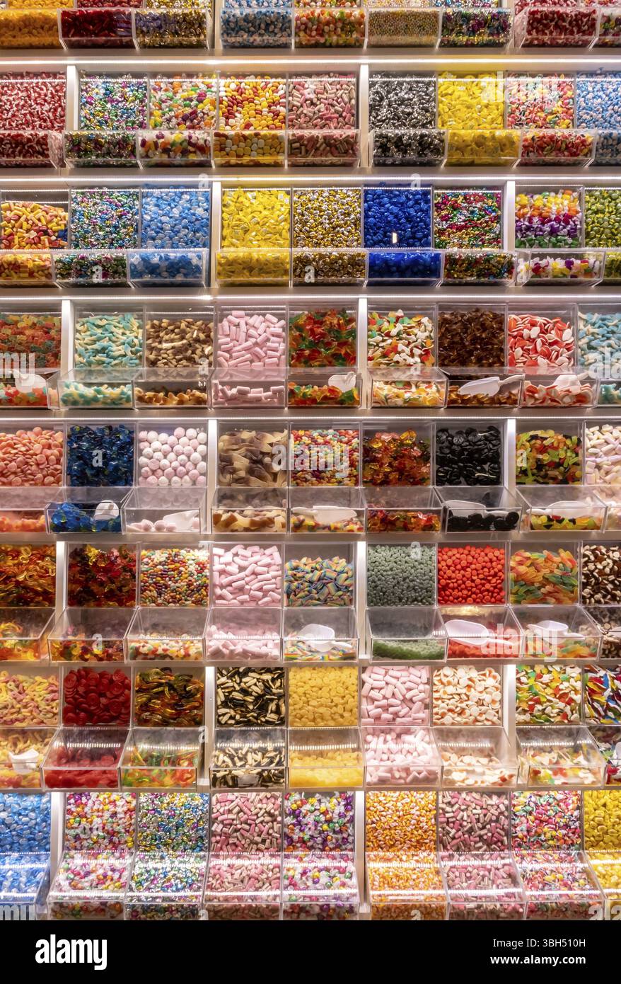 Candy display on a market. Various sweets for self-service Stock Photo ...
