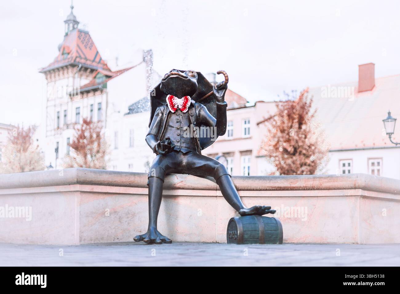 Bielsko-Biala, Poland - a cute frog holding an umbrella figure at ...