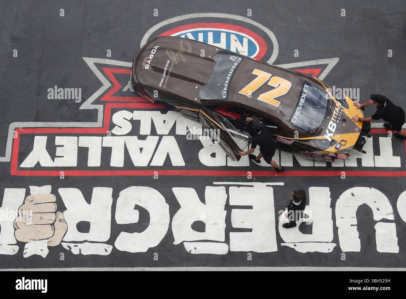 BRISTOL, TN - JUNE 07: The race team of Cody Coughlin pushes his race ...